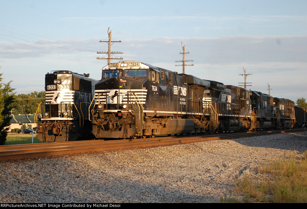 NS ES-40DC #7634 leads a westbound across Maifeld Rd.